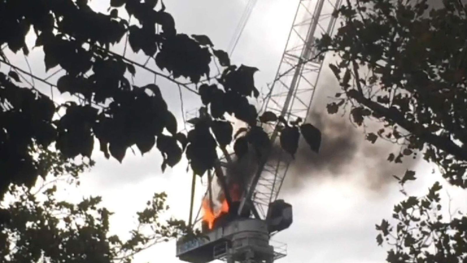 Crane Collapses After Fire At Building Site | World News | Sky News