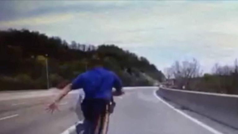 Cop Saves Man Trying To Jump Off Bridge | Scoop News | Sky News