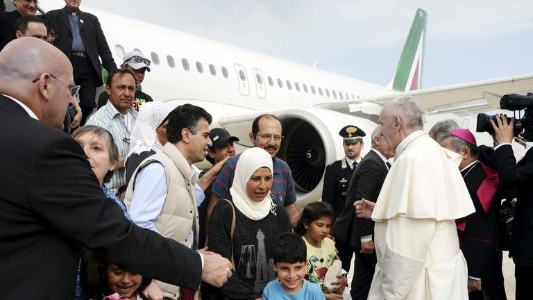 Pope Takes 12 Refugees Back Home To Rome | World News | Sky News