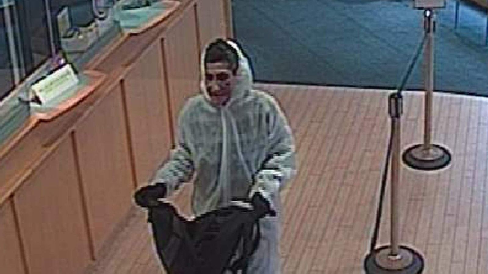 Hunt For Purple-Haired Woman Bank Robber | UK News | Sky News