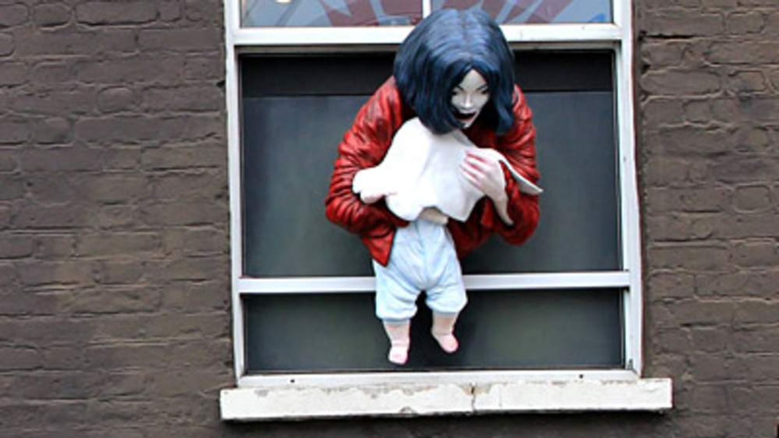 Jacko Dangling Child Sculpture Sparks Fury | Ents & Arts News | Sky News