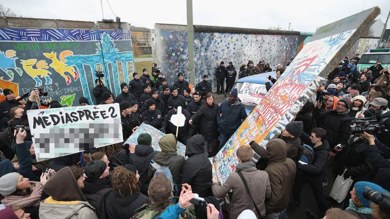 Berlin Wall Protesters Halt Demolition Work | World News | Sky News