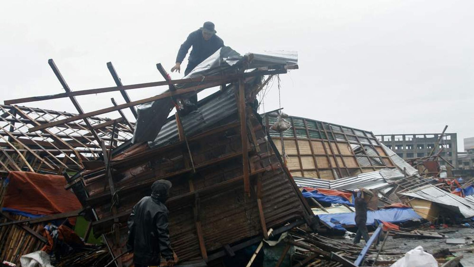 Typhoon leaves three dead, forces nearly a million from their homes ...