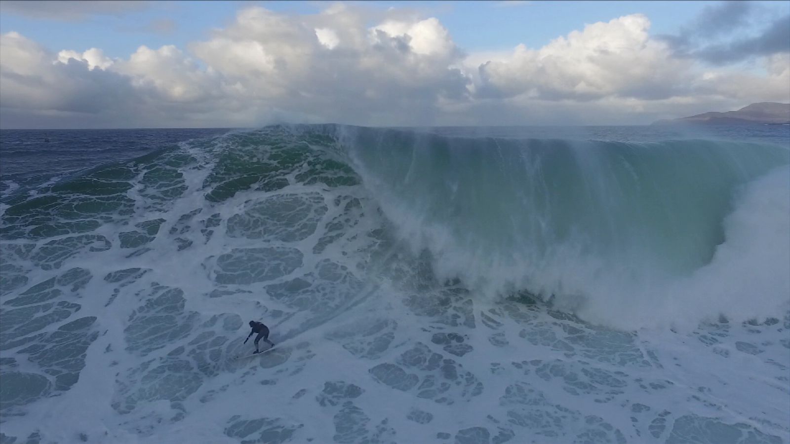 Would You Surf A 100ft Wave?
