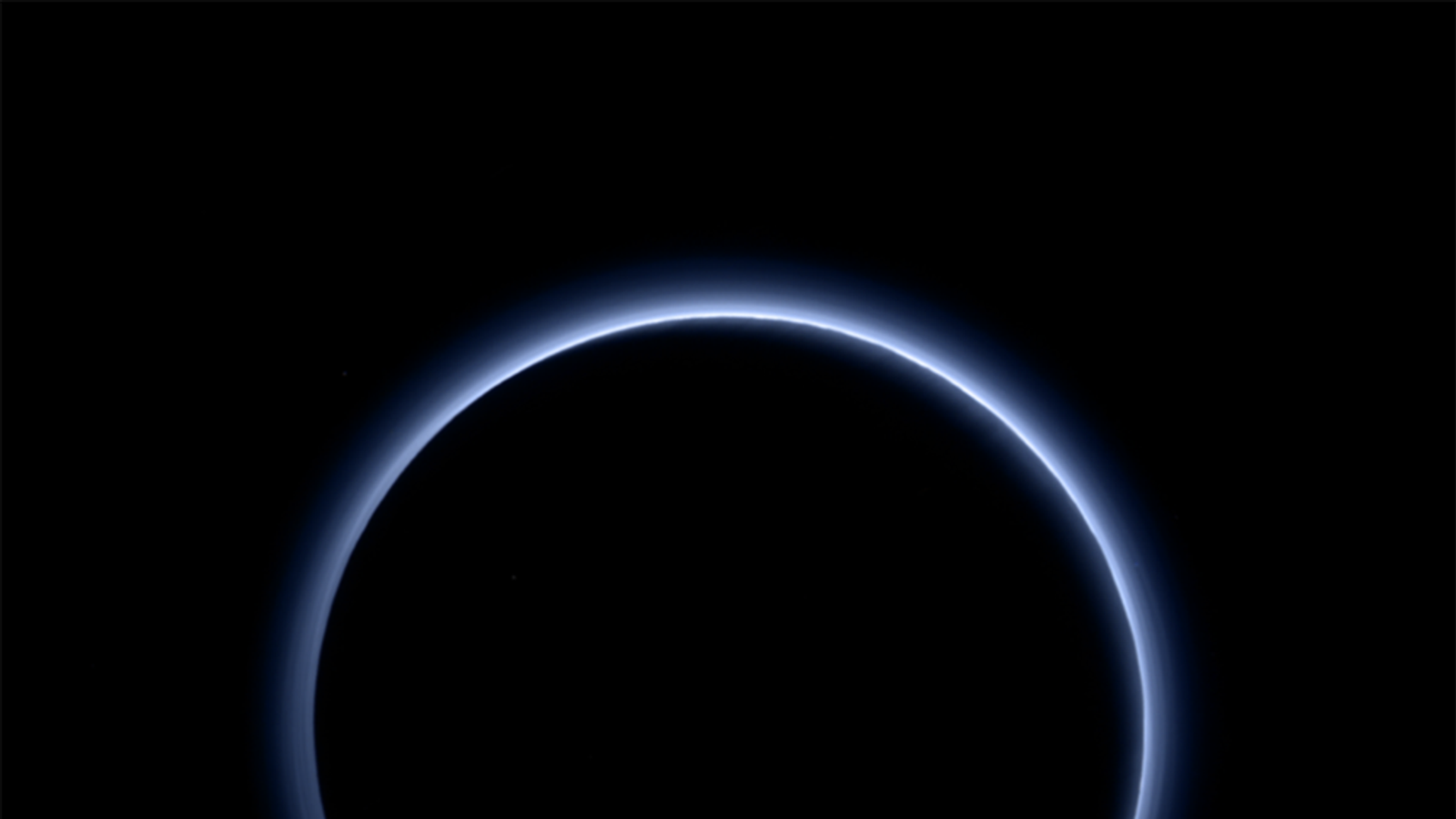 Space Probe Reveals Blue Haze Surrounds Pluto | World News | Sky News