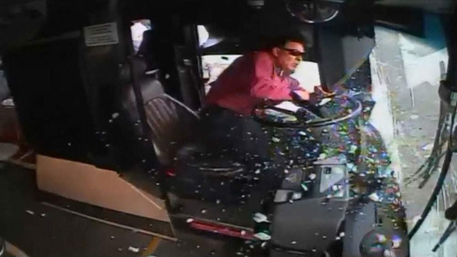 Crash Sends Bus Driver Flying Through Window | US News | Sky News