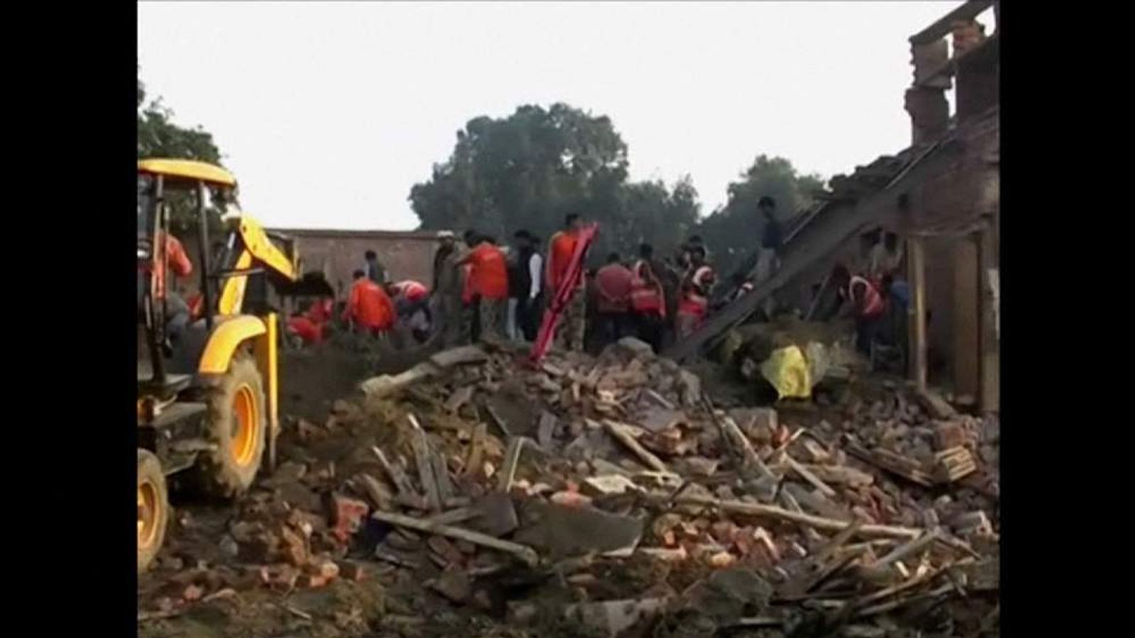 Family 'Buried Alive' After Building Collapses | World News | Sky News