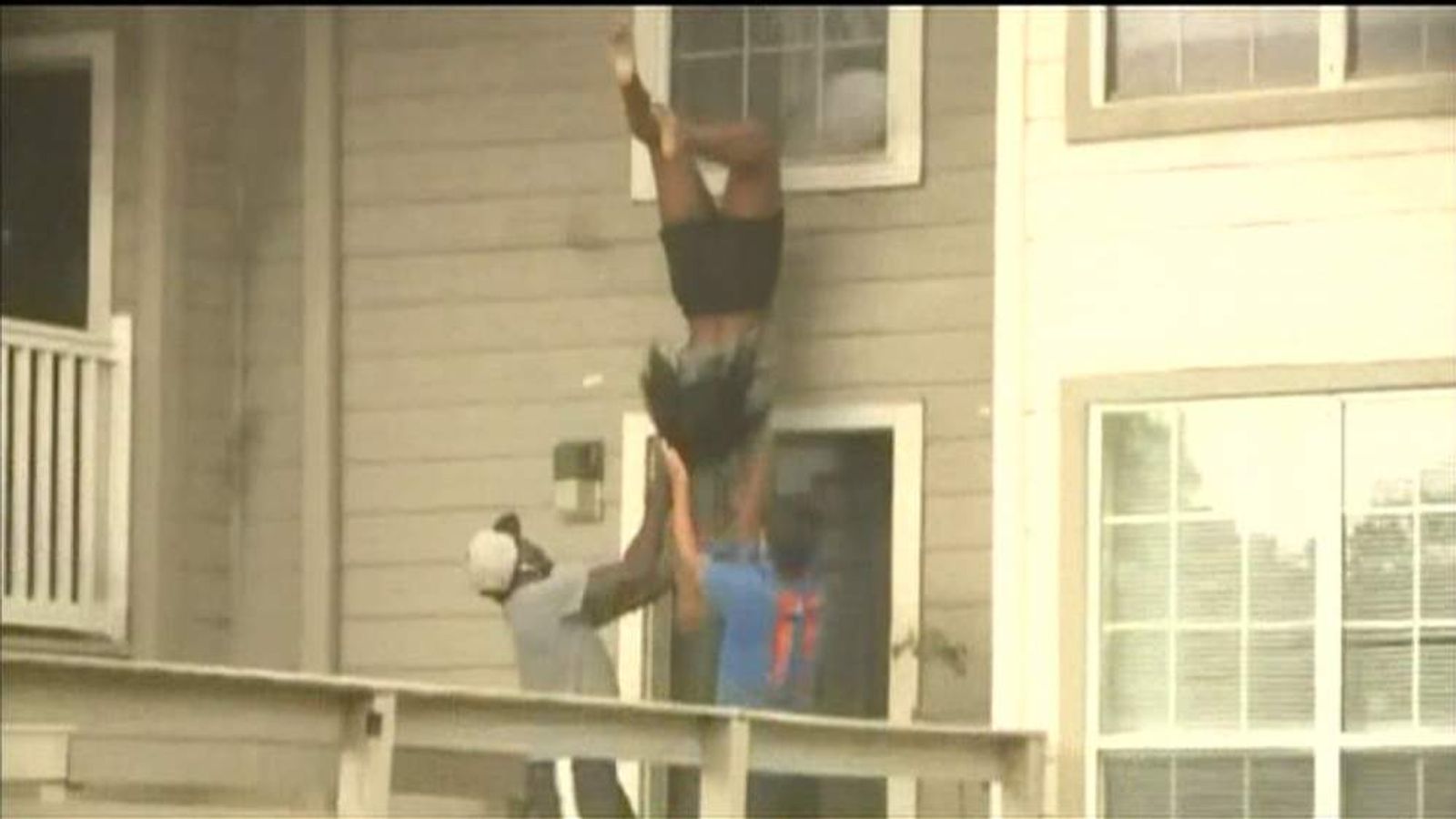 Women Saved As They Jump From Burning Building | US News | Sky News