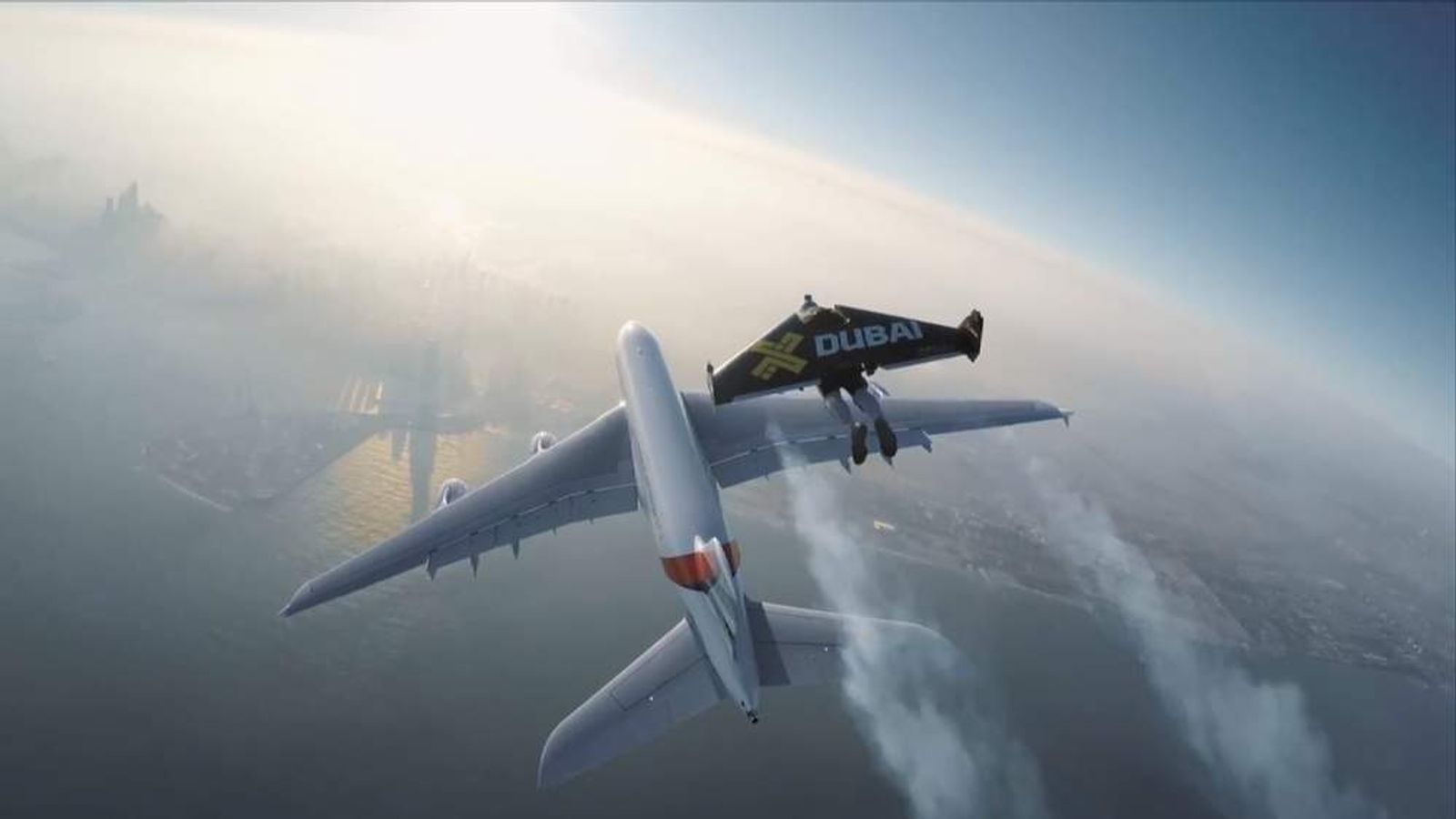 Jetpack-Flying Stuntmen Race Alongside Jumbo | World News | Sky News