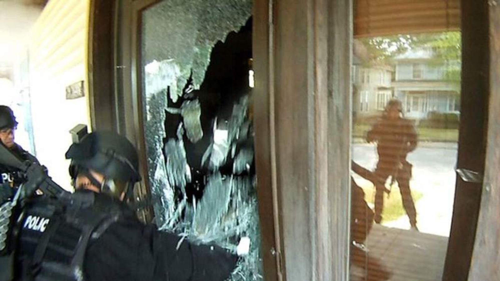 Police Breaking Into A House