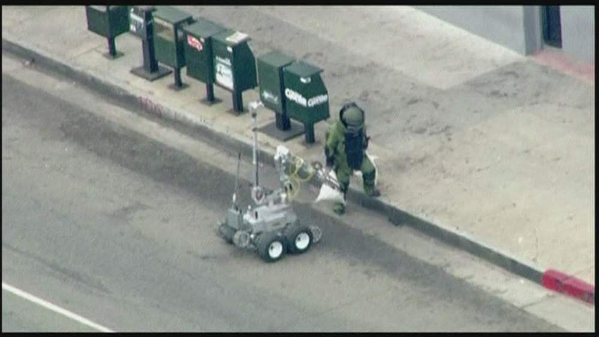 Robbers Turn Female Bank Worker Into A 'Bomb' | World News | Sky News