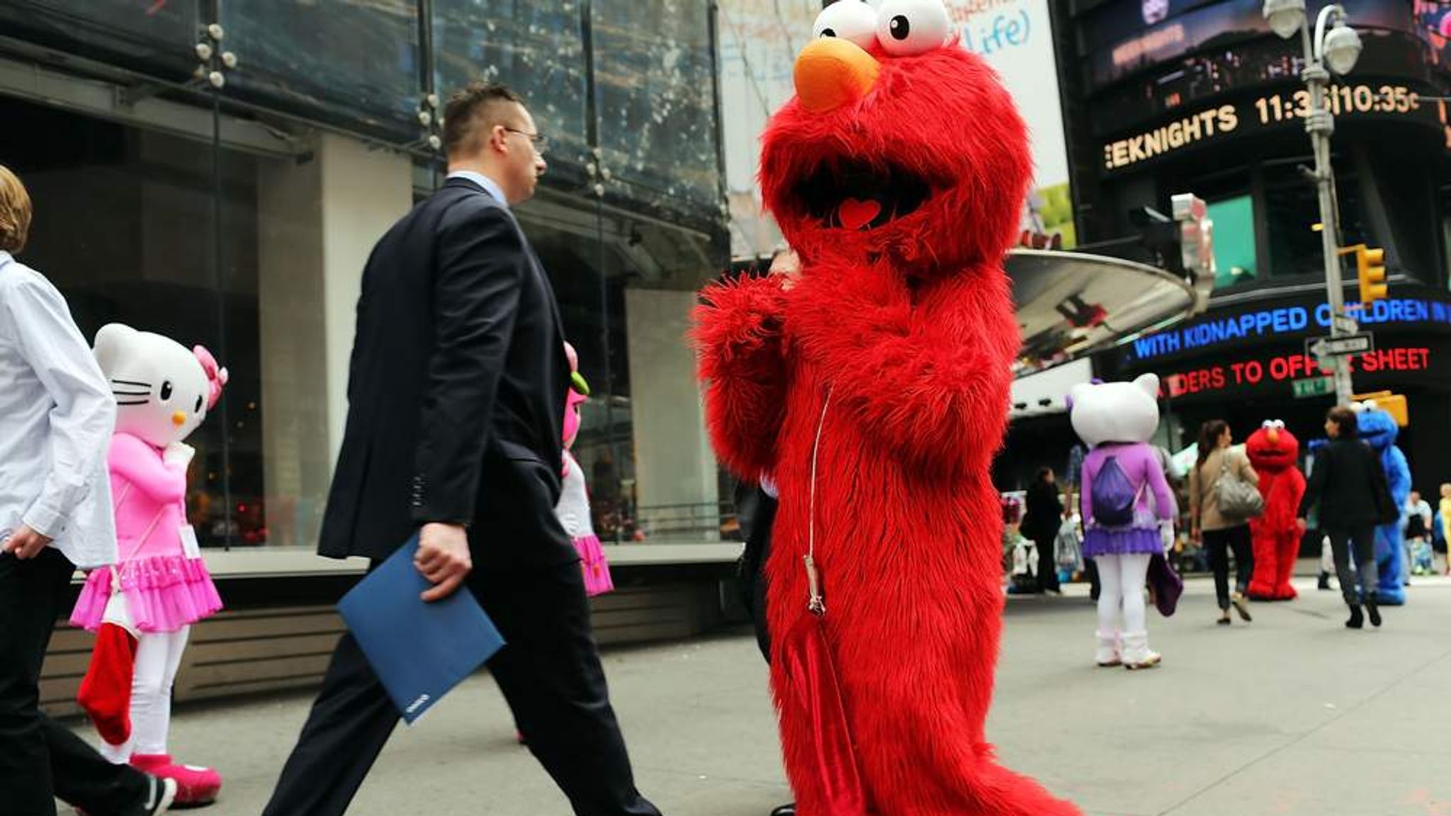 Times Square Super-Heroes Fight For Image | US News | Sky News