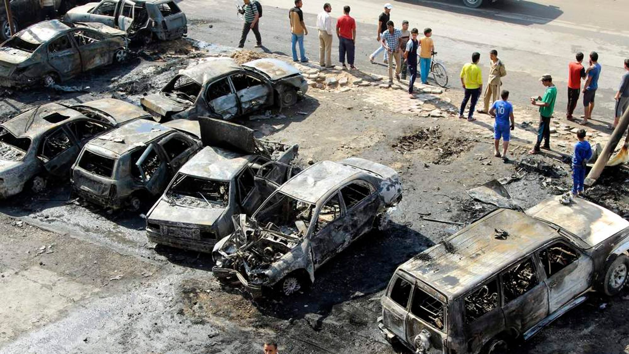 Ten Cars Explode In Baghdad, Killing Dozens | World News | Sky News