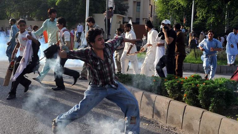 Police And Protesters Clash In Pakistan | World News | Sky News