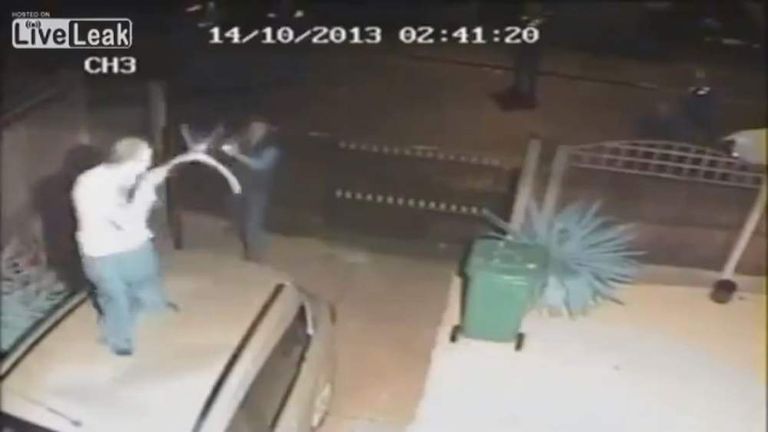 CCTV: 'Shears Intruder' Tasered Off Car Roof | UK News | Sky News