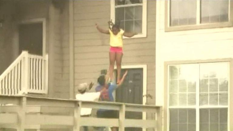 Women Saved As They Jump From Burning Building | US News | Sky News