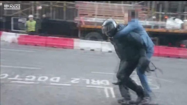 Watch: Shop Owner Jumps On Armed Robber's Back | UK News | Sky News