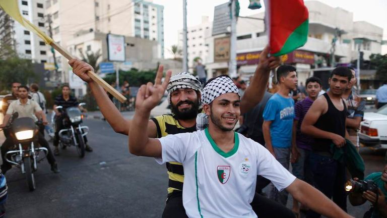 Gazans celebrate what they claim is a victory in the conflict | Scoop ...