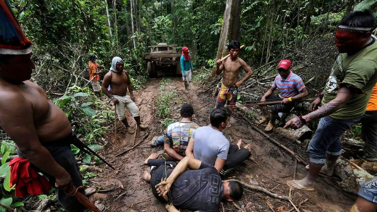 Tribes Capture Men Accused of Illegal Logging | World News | Sky News Tribes Capture Men Accused of Illegal Logging | World News | Sky News