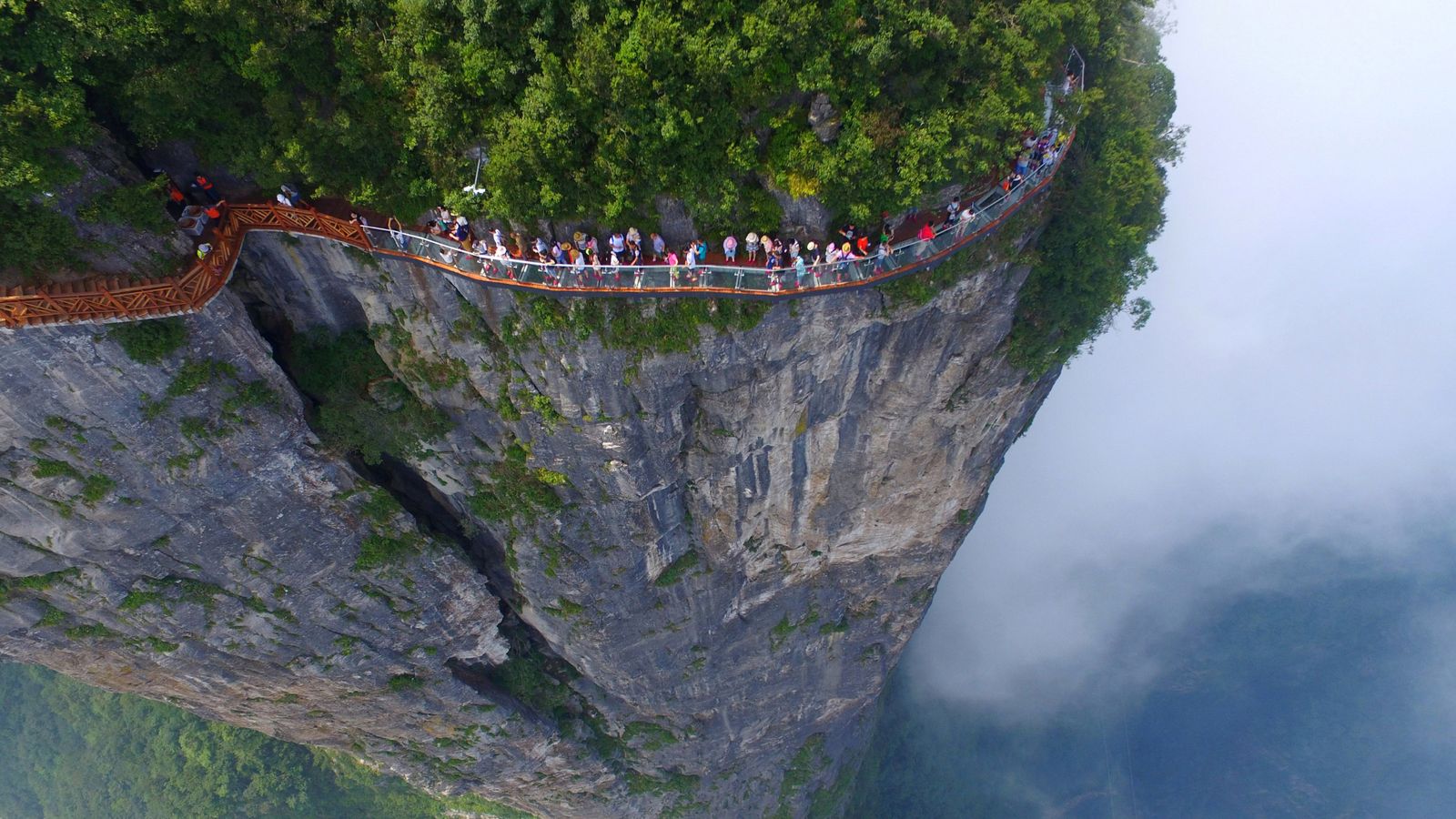 Glass Walkway On Sheer Cliff Opens In China | World News | Sky News