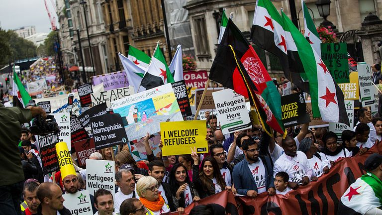 Thousands join pro-refugee march ahead of UN migrant summit | UK News ...