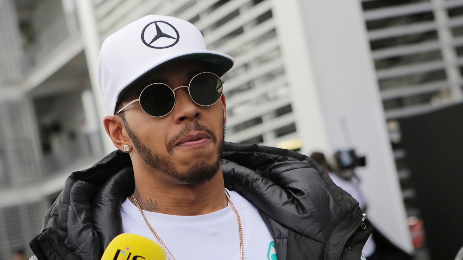 Lewis Hamilton's F1 team member held at gunpoint | World News | Sky News