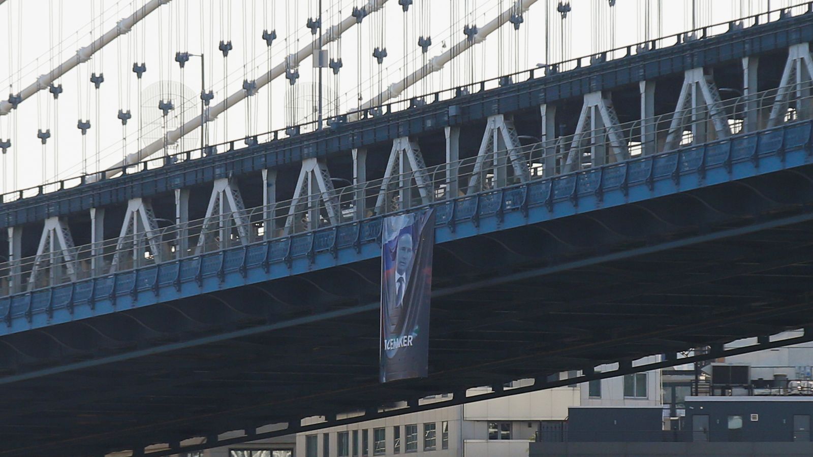 Vladimir Putin 'peacemaker' banner hung from Manhattan Bridge | World ...