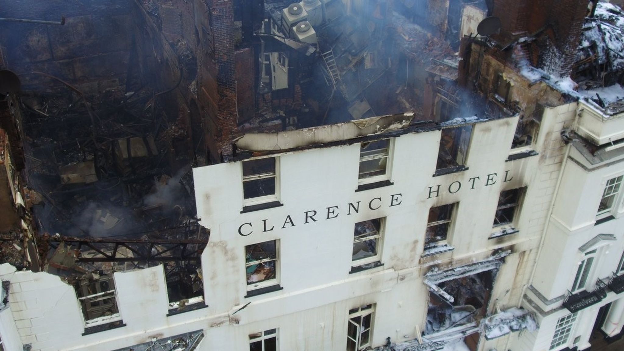 Drone footage shows fire damage to 'oldest hotel' | UK News | Sky News