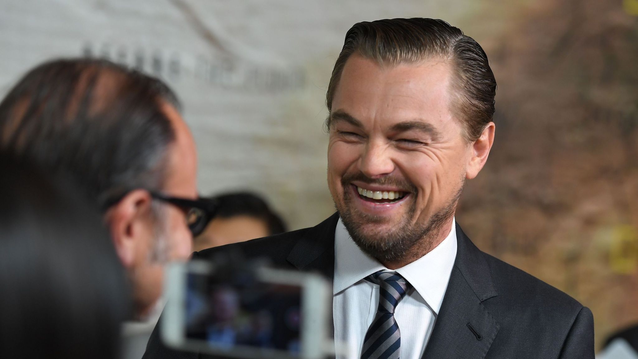 DiCaprio greeted by screaming fans at Edinburgh charity eatery | Ents ...