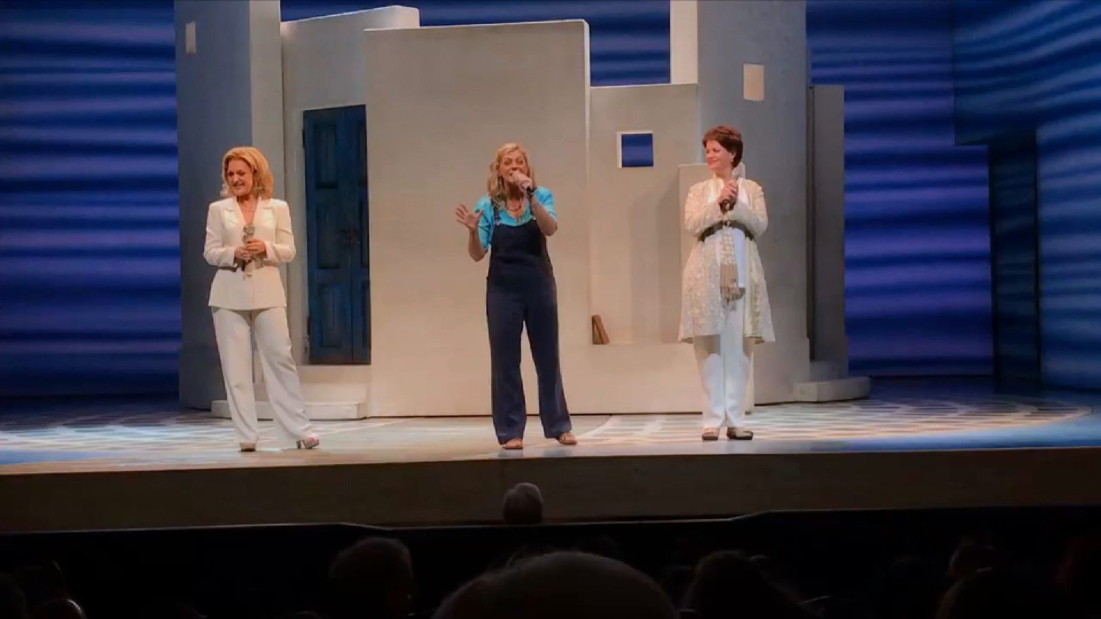 The cast came on the stage at the beginning to teach everyone lines ...