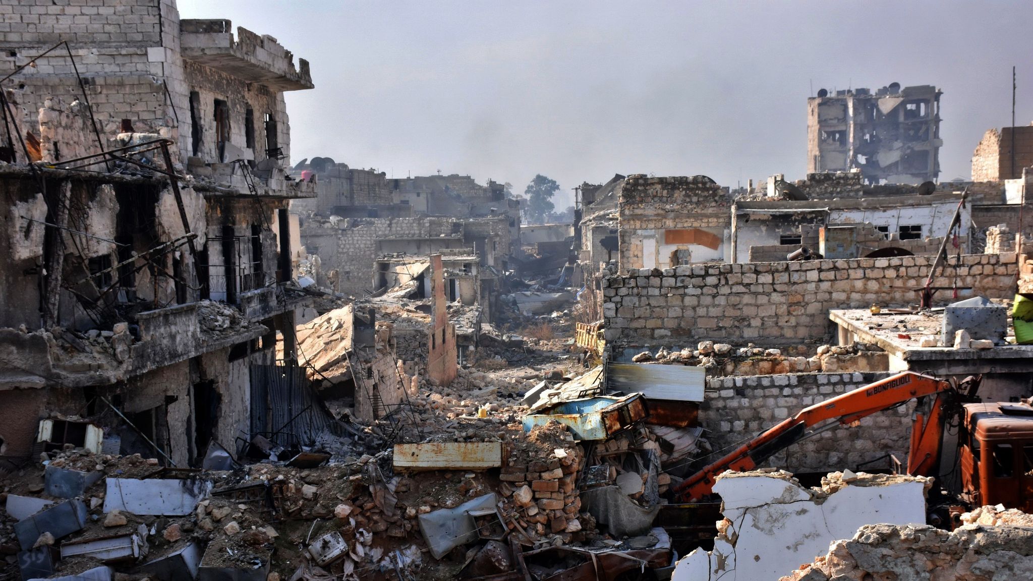 Aleppo: More than 100 children trapped in a building which is under ...