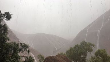 Stunning waterfalls on Uluru after freak storm hits the Australian rock ...
