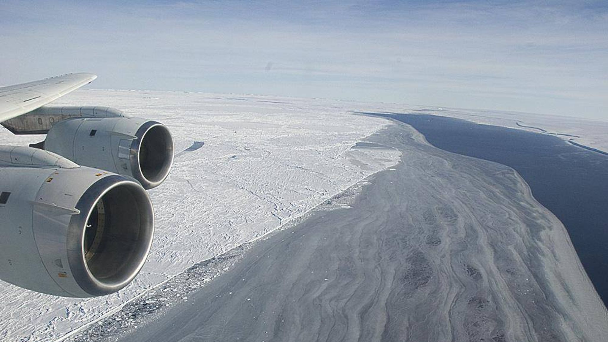 New crack in Antarctic ice shelf with iceberg already 'hanging by a ...
