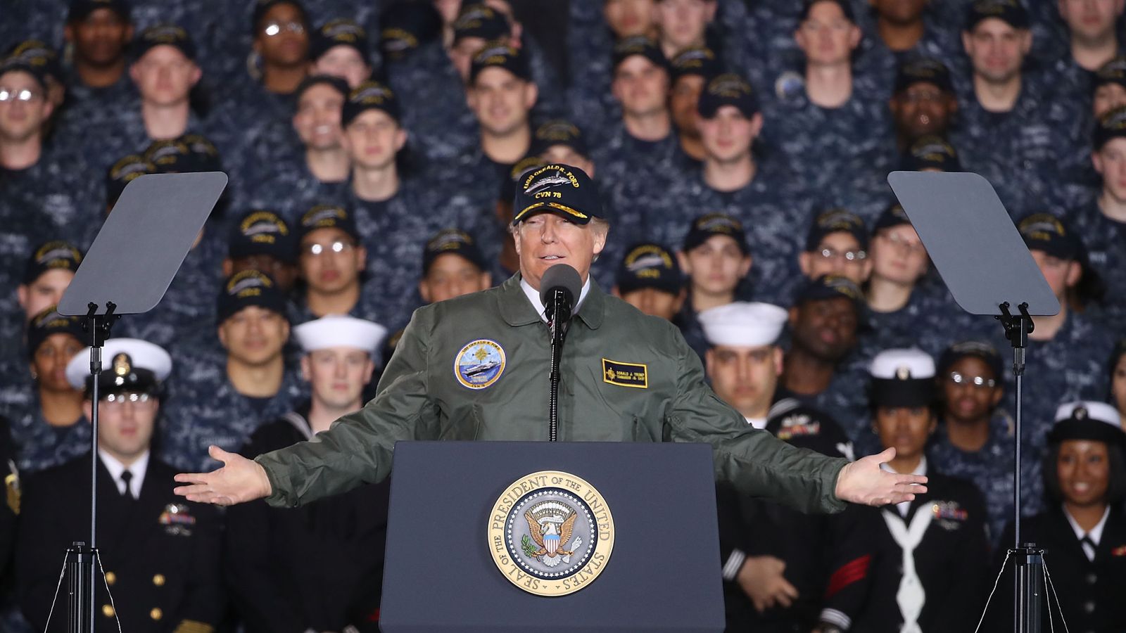 Trump swaps trademark red cap for 'great looking' navy hat | World News ...