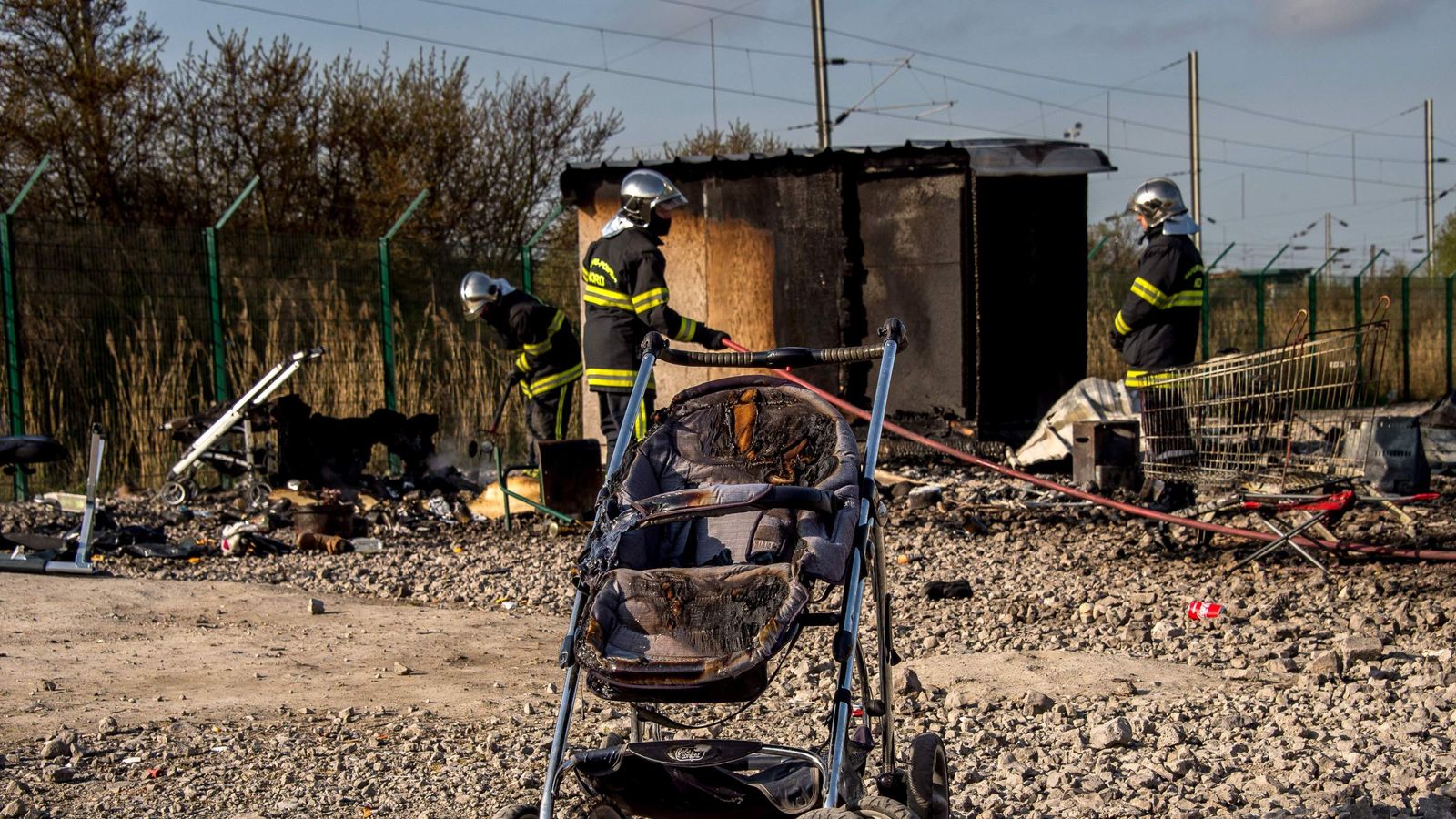 Fire reduces French migrant camp to ashes | World News | Sky News