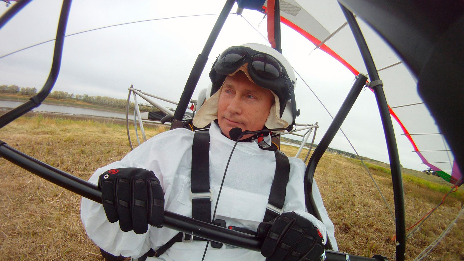 Bare-chested Vladimir Putin plunges into icy lake in latest macho photo ...