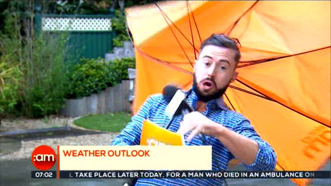 Weather presenter Deric Hartigan blown away by gust of wind