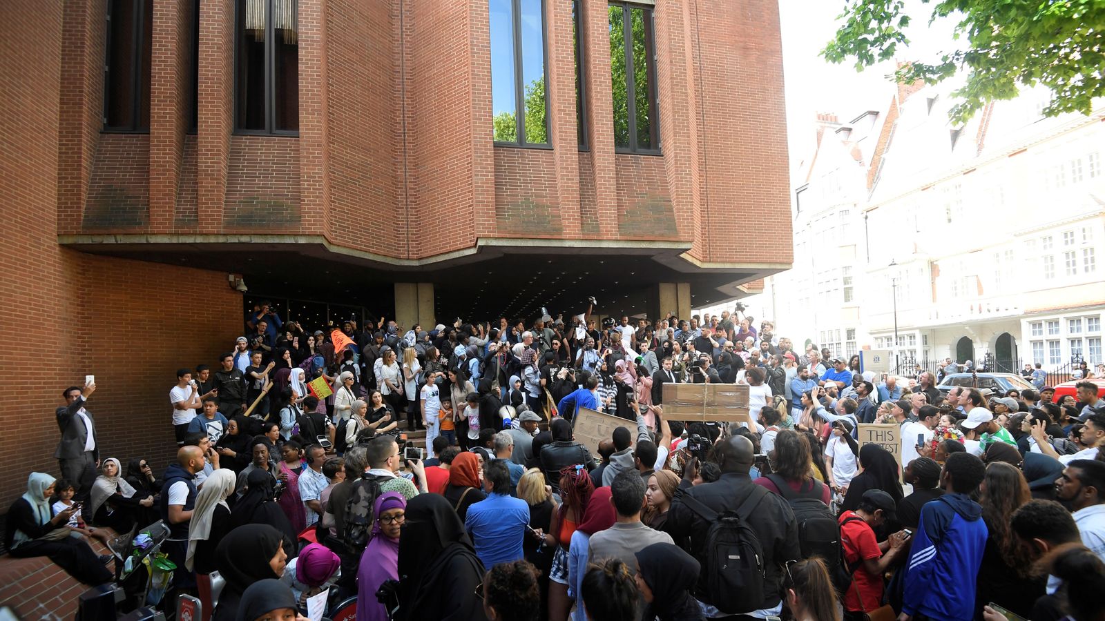 In pictures: Tempers flare during Grenfell Tower fire protests | UK ...