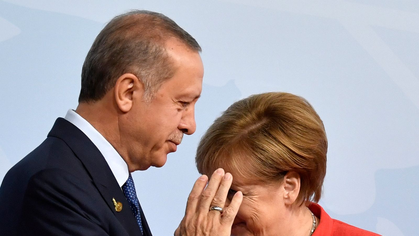 Kiss cam: Merkel meets world leaders at G20 | World News | Sky News