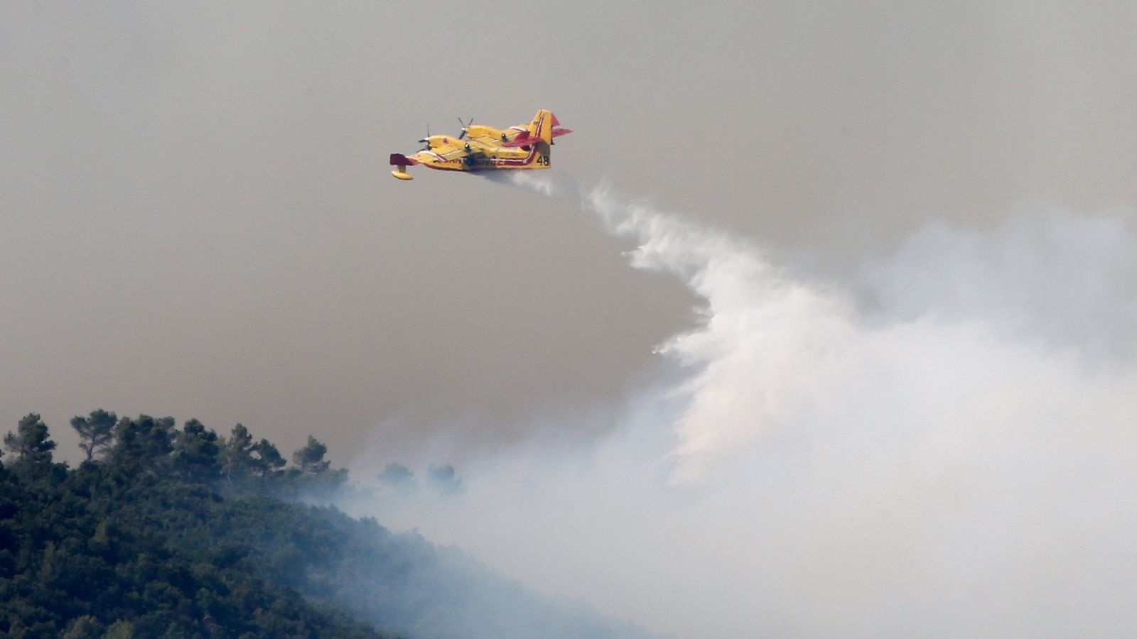 French fires force evacuation of 12,000 people | World News | Sky News