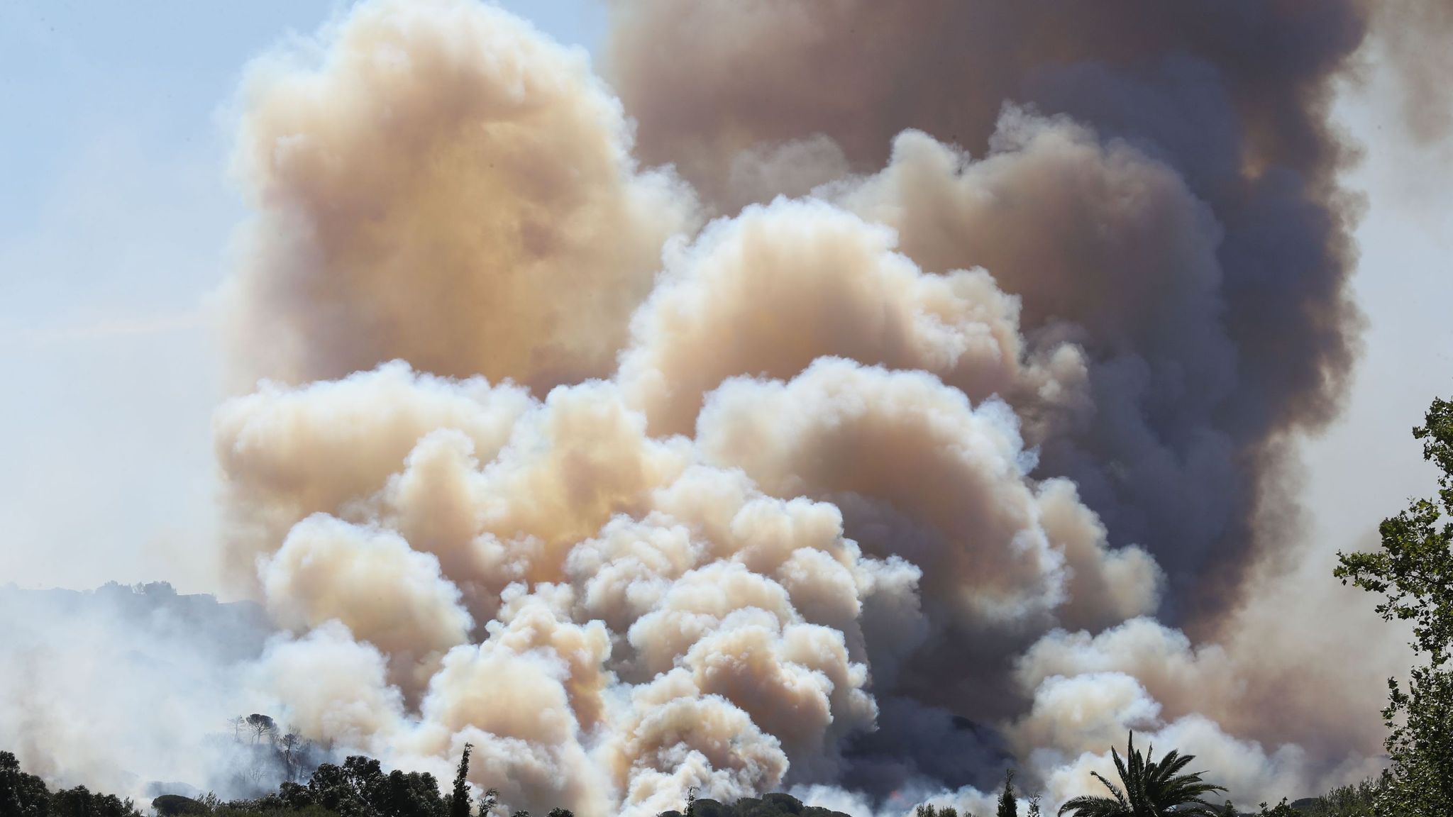 French fires force evacuation of 12,000 people | World News | Sky News