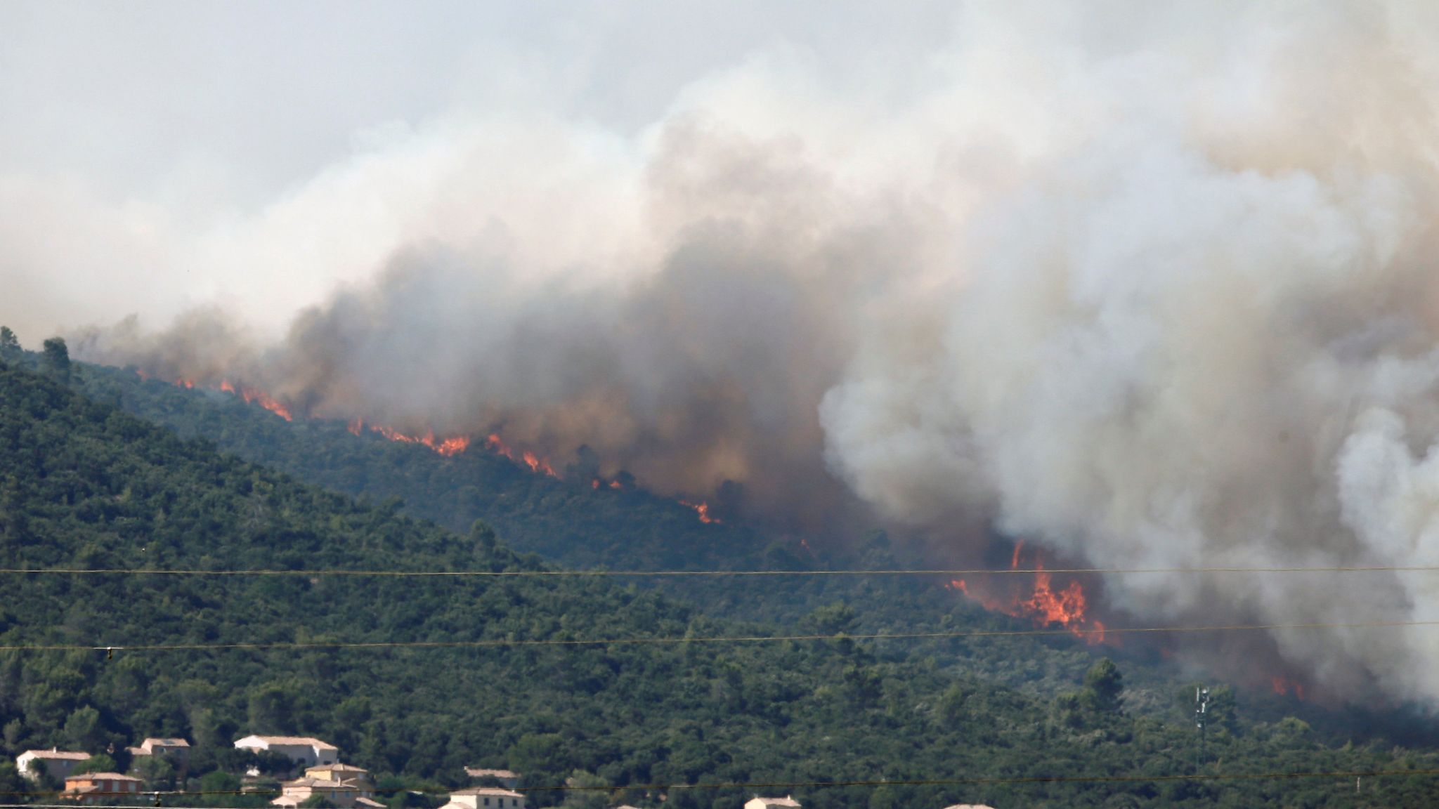 French fires force evacuation of 12,000 people | World News | Sky News