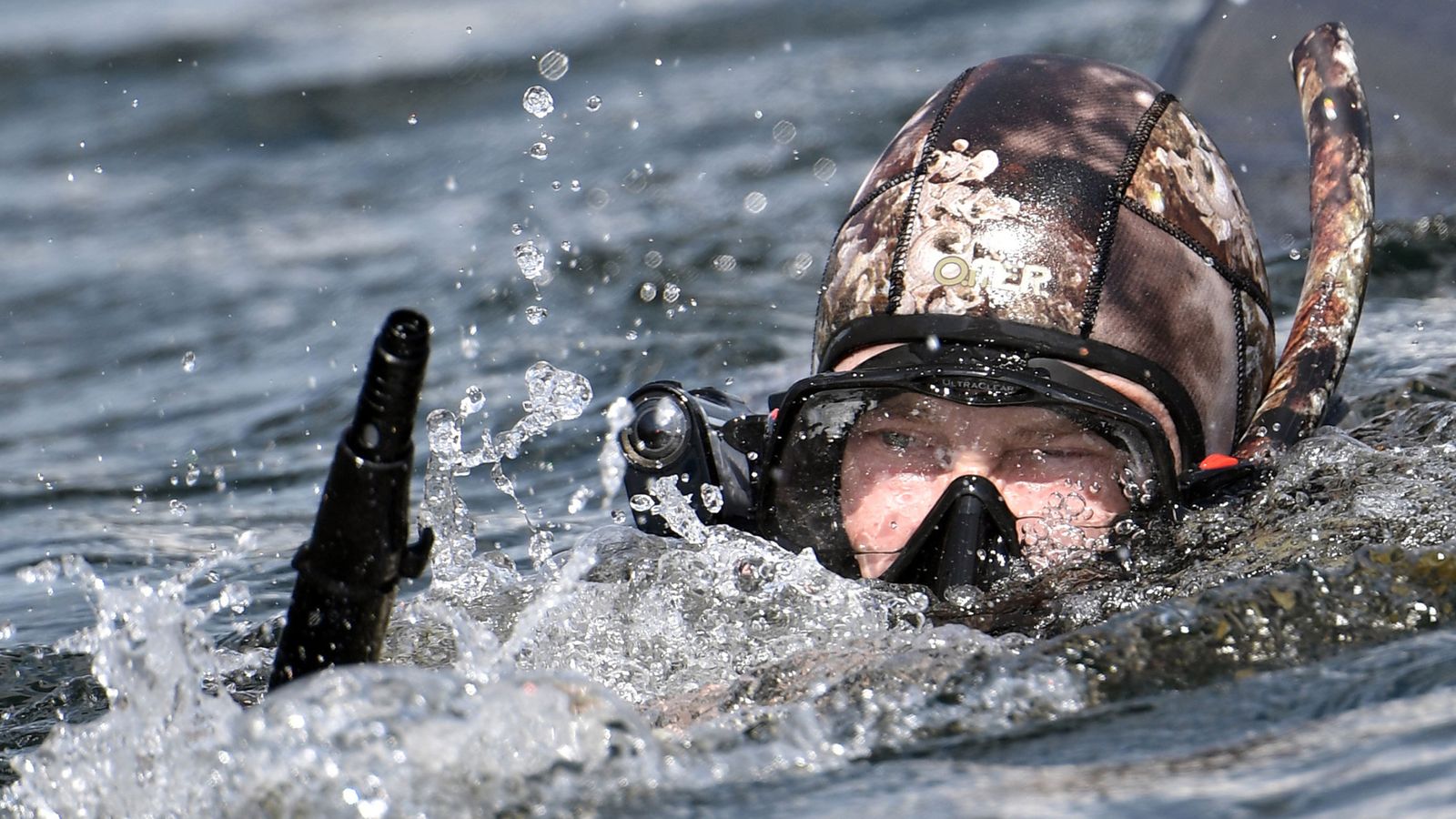 Shirtless Vladimir Putin sunbathes and fishes at Siberian lake | UK ...