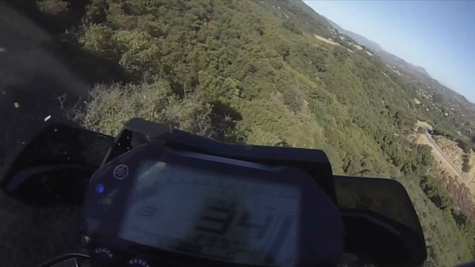 Motorcyclist survives 250ft cliff fall | World News | Sky News