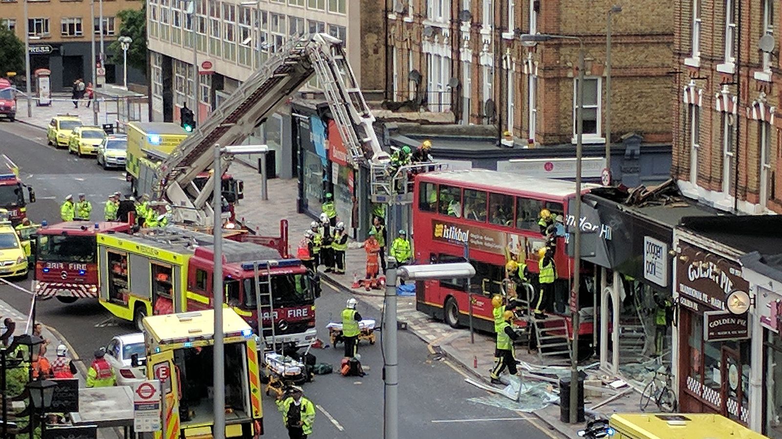 Ten injured after double-decker bus crashes into London shop | UK News ...