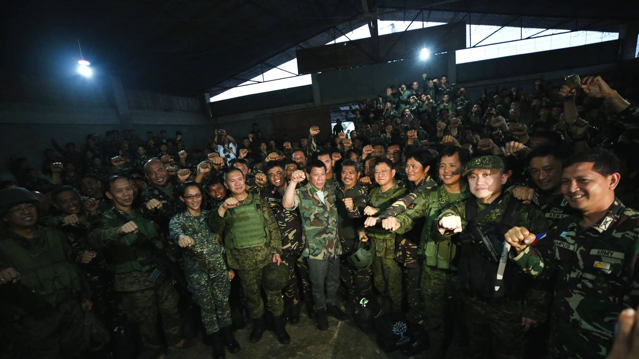President Rodrigo Duterte fires sniper rifle towards militants in ...
