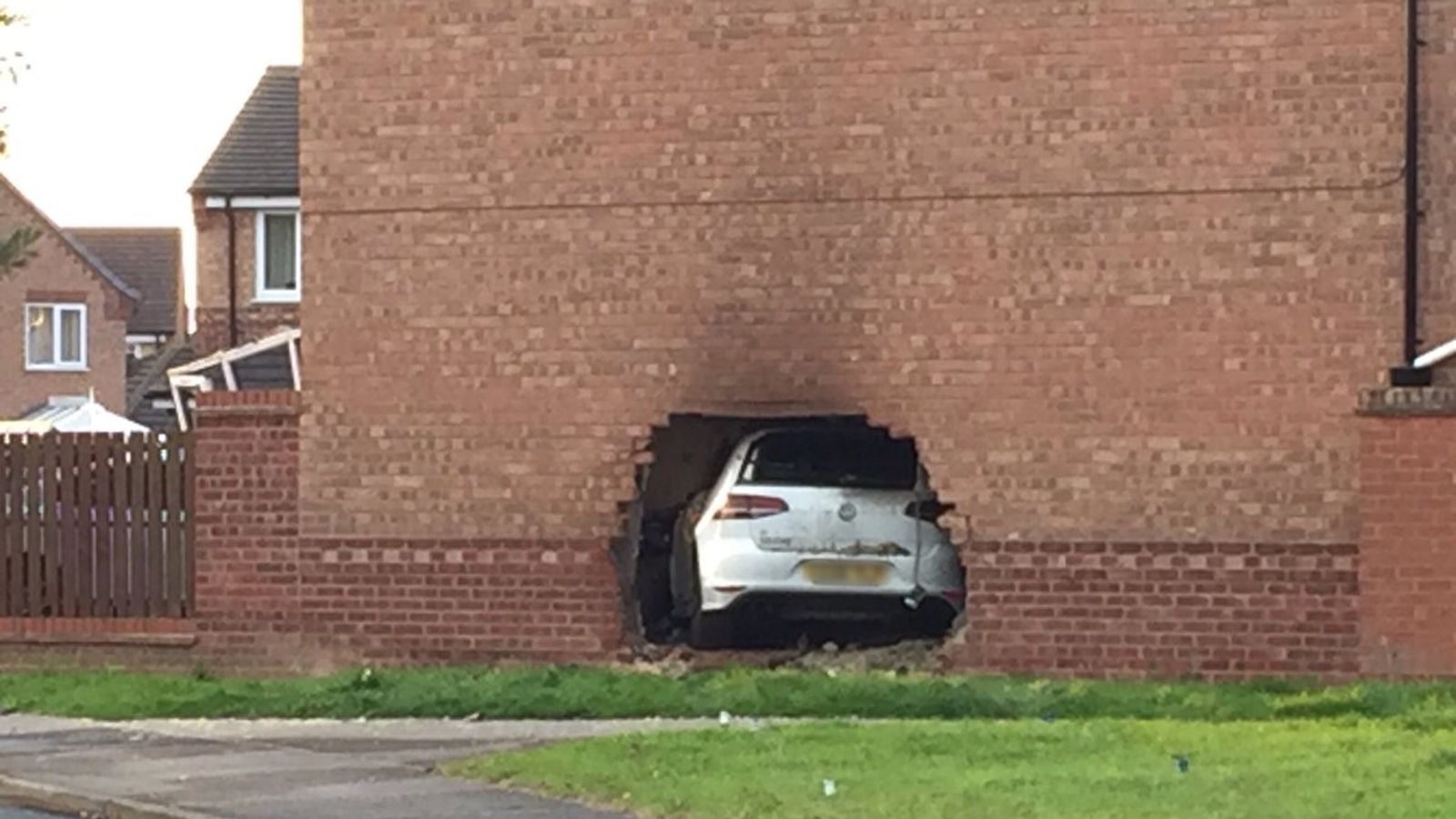 Man on sofa among four hurt after car hits house in York and catches ...