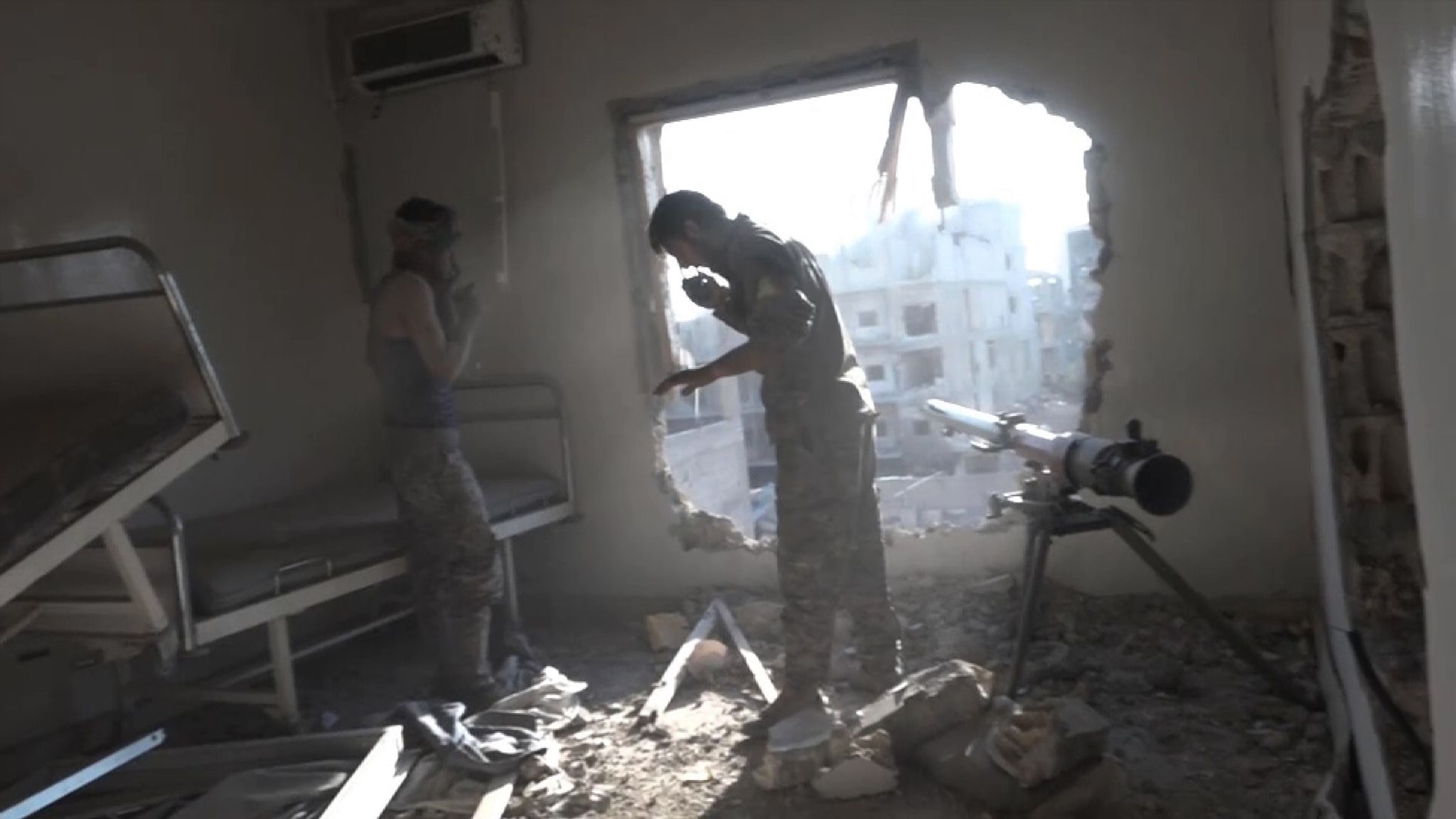 Troops surround last IS stronghold in Raqqa | World News | Sky News