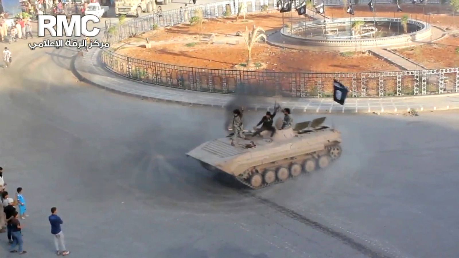 Syrian forces celebrate Raqqa victory with tank doughnuts | World News ...