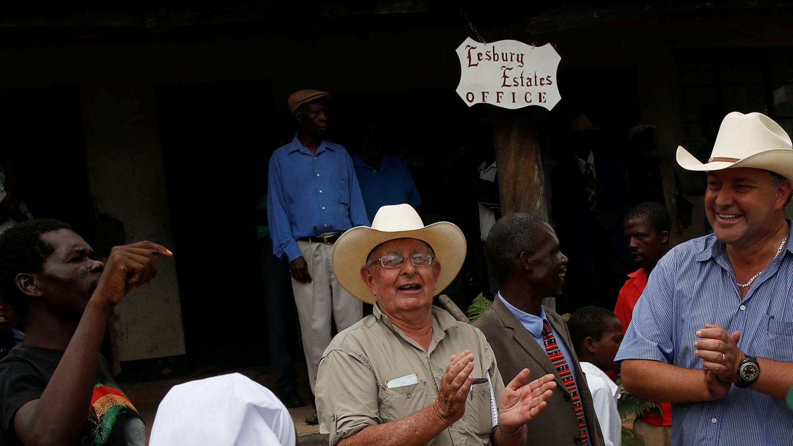 White Zimbabwean farmer get back land seized under Robert Mugabe rule | World News | Sky News